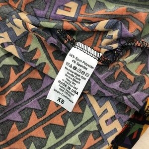 LuLaRoe | Skirts | Lularoe Xs Madison Skirt Purple Green Black Print ...